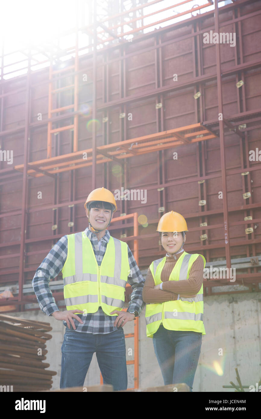 Smiling confident construction workers Stock Photo - Alamy