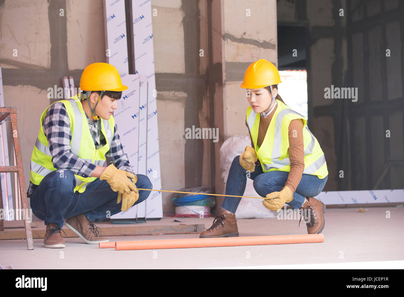 Construction workers site holding hi-res stock photography and images ...