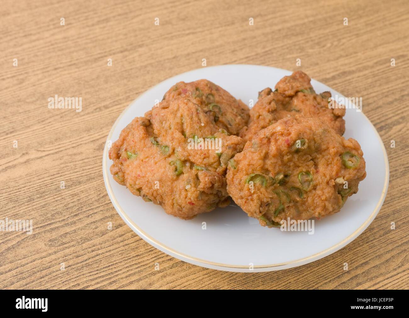 Deep fried white fish cake hi-res stock photography and images - Alamy