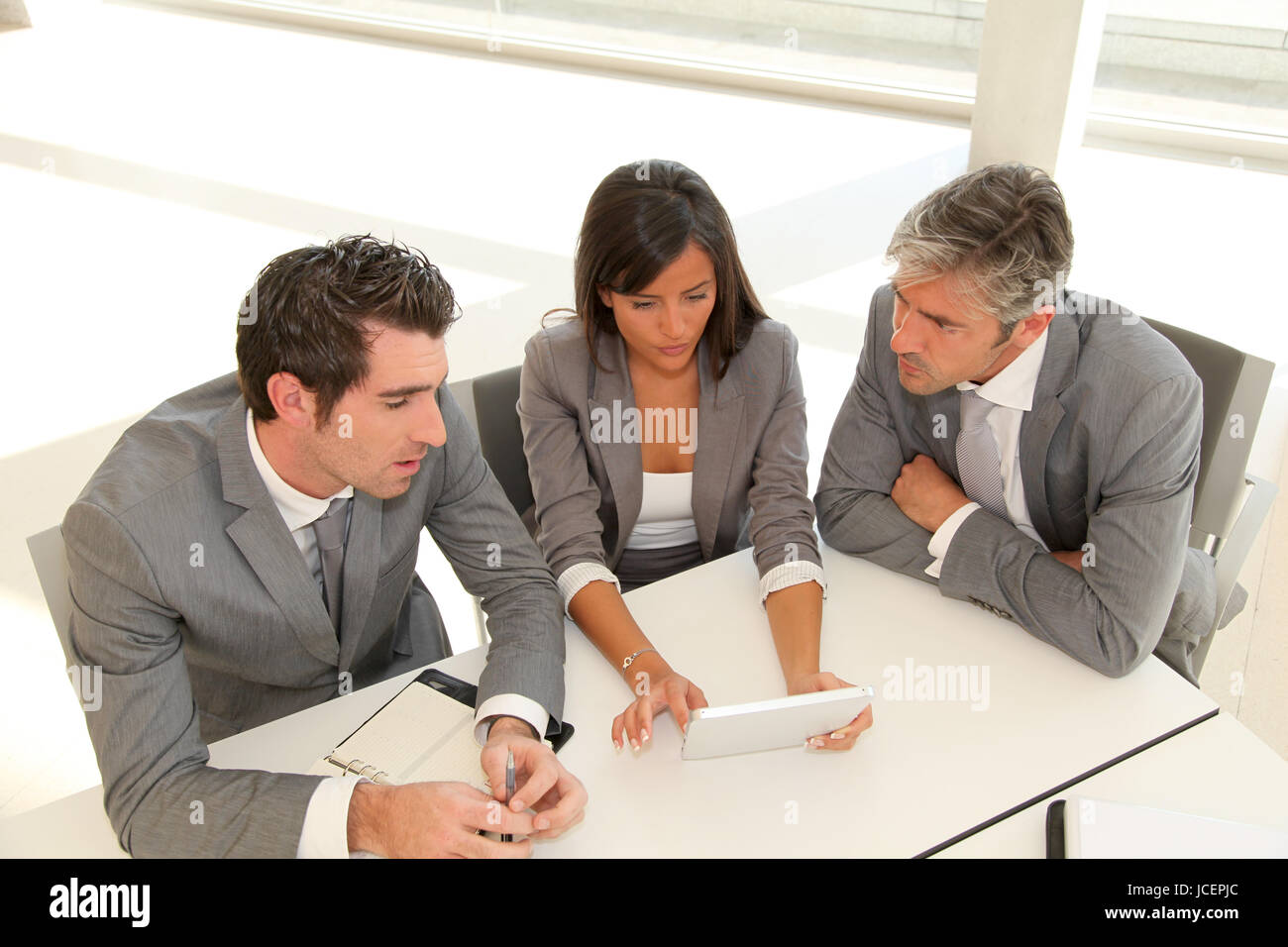 Business meeting with electronic tablet Stock Photo - Alamy