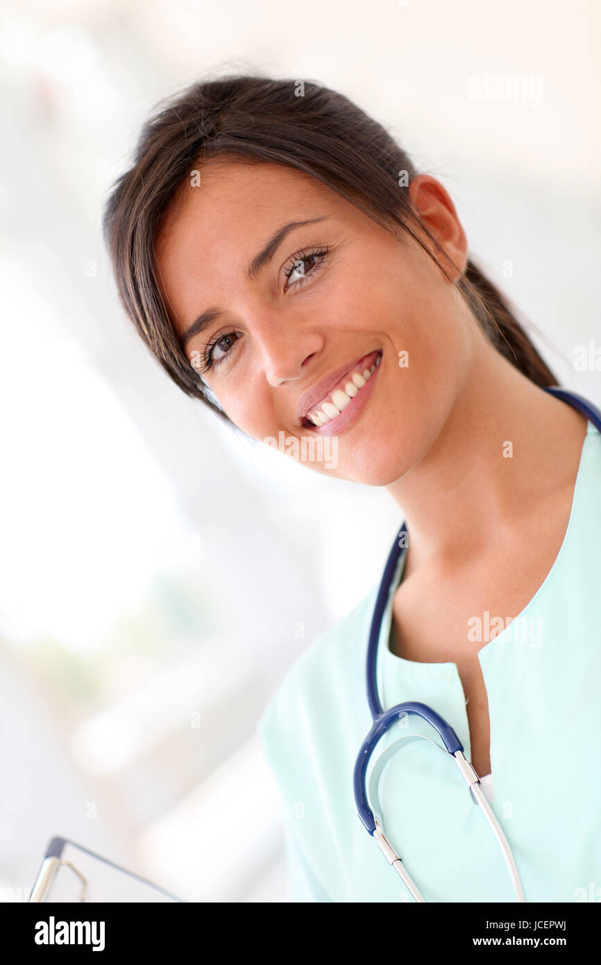 Portrait of beautiful smiling nurse Stock Photo - Alamy