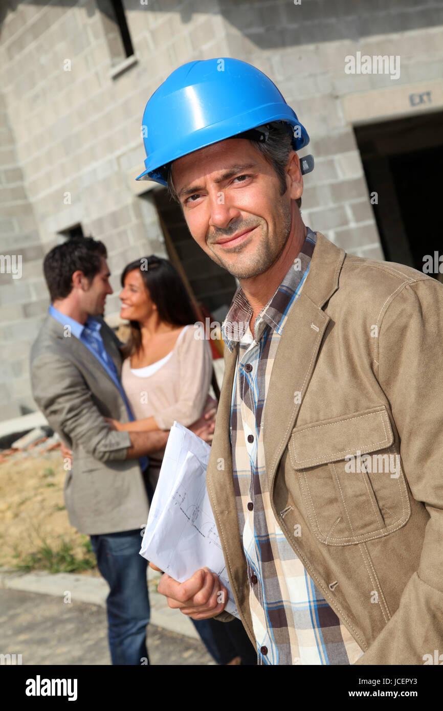 Portrait of smiling entrepreneur standing on construction site Stock ...