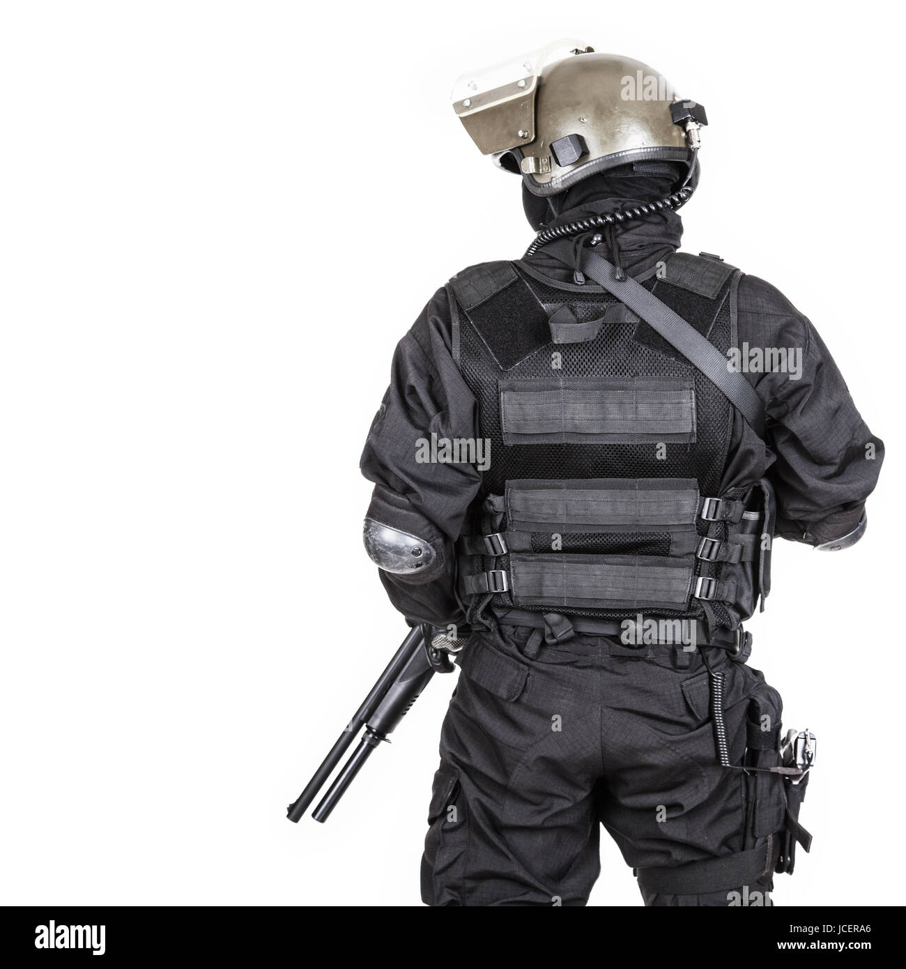 Spec ops soldier in black uniform and face mask shot from behind Stock ...