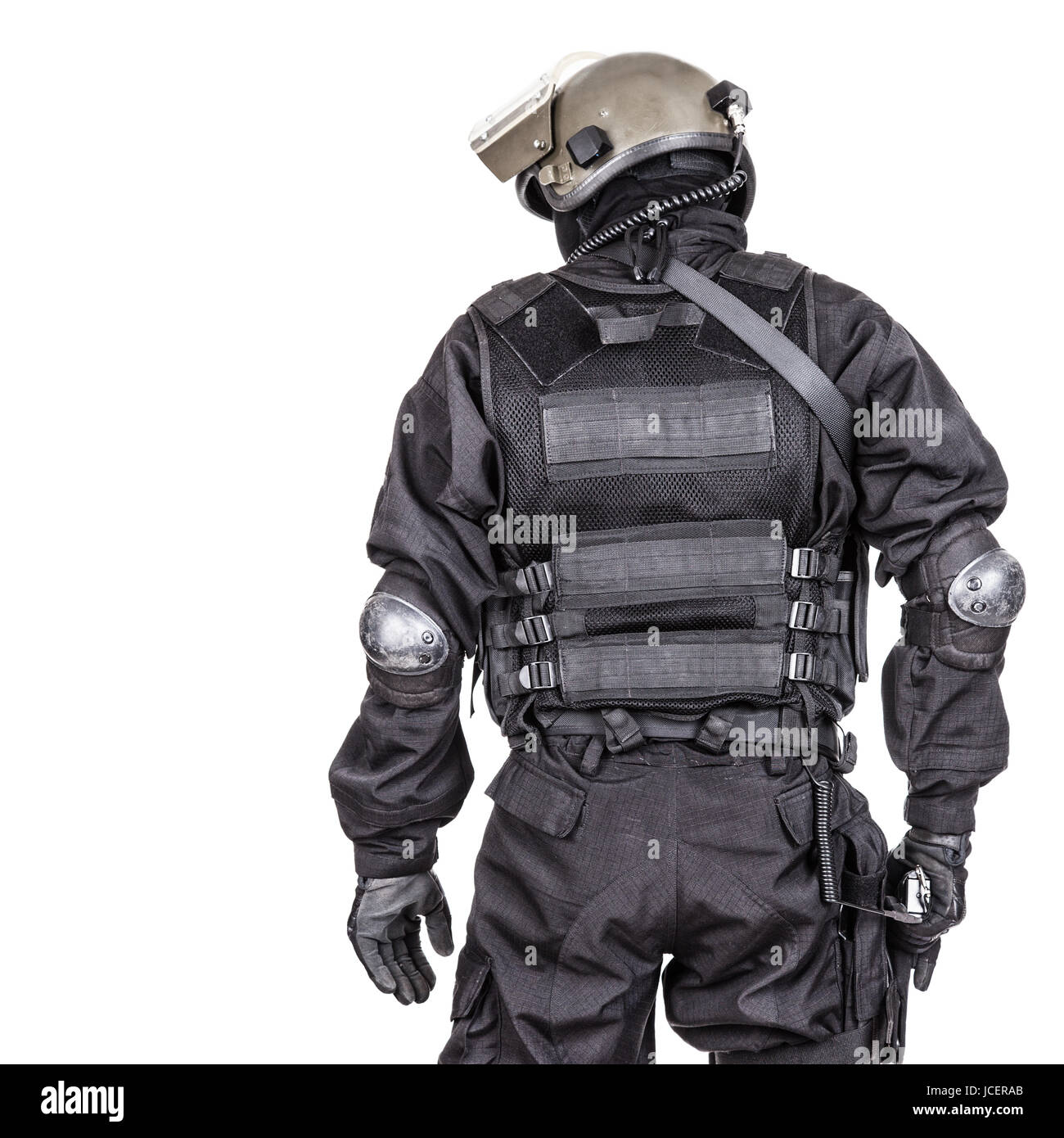 Spec ops soldier in black uniform and face mask shot from behind Stock ...