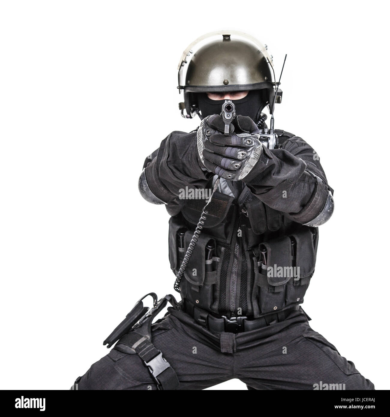 Spec ops soldier in black uniform and face mask aiming his pistol Stock ...