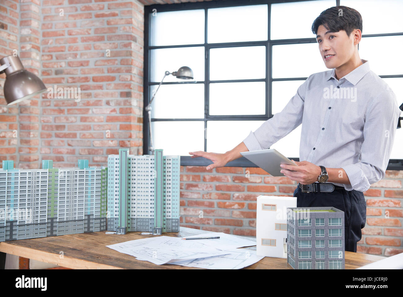 Male architect working blueprint hi-res stock photography and images ...