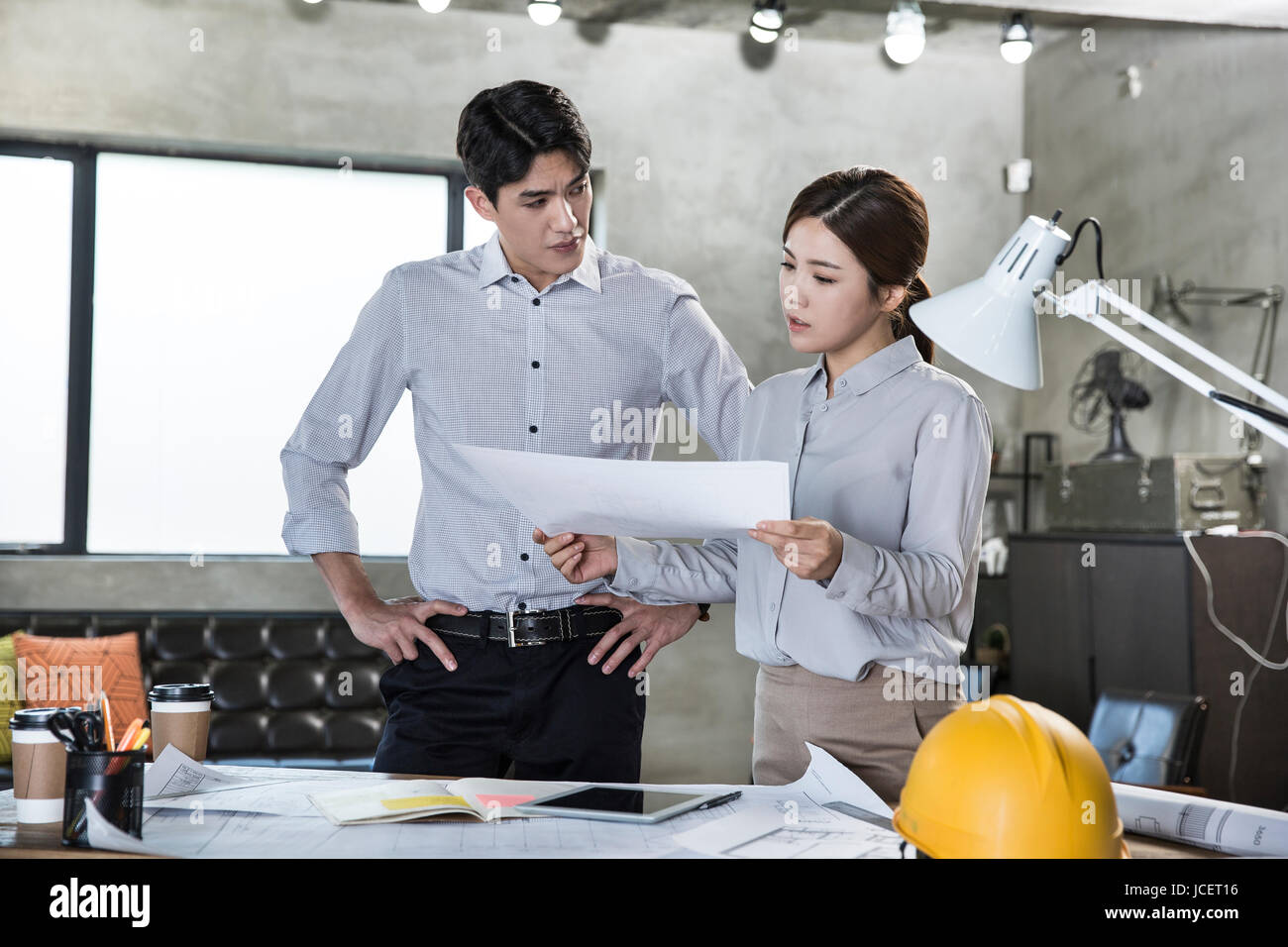 Young architects working at office Stock Photo - Alamy