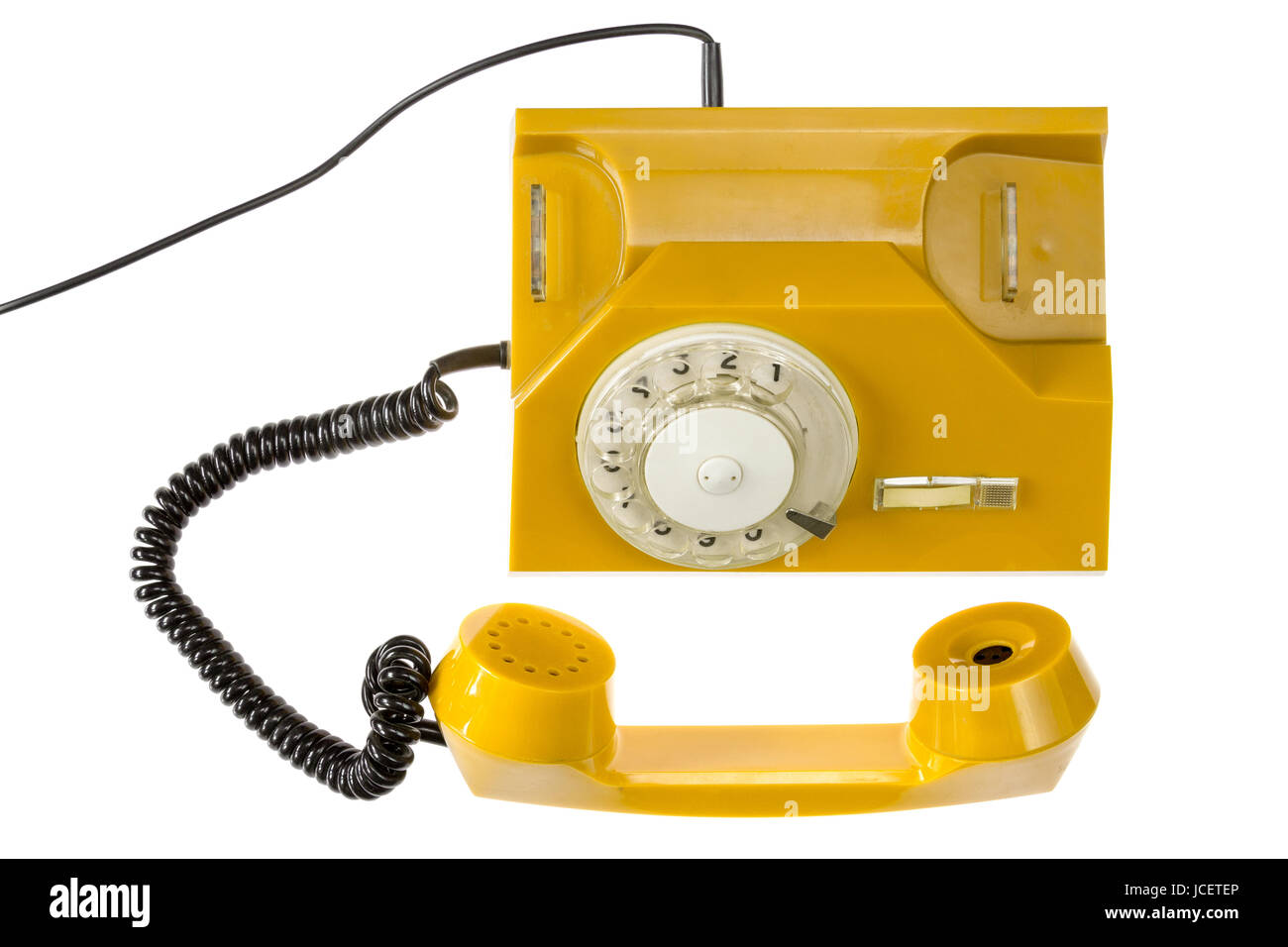 Yellow rotary phone isolated on white background. Top view Stock Photo ...