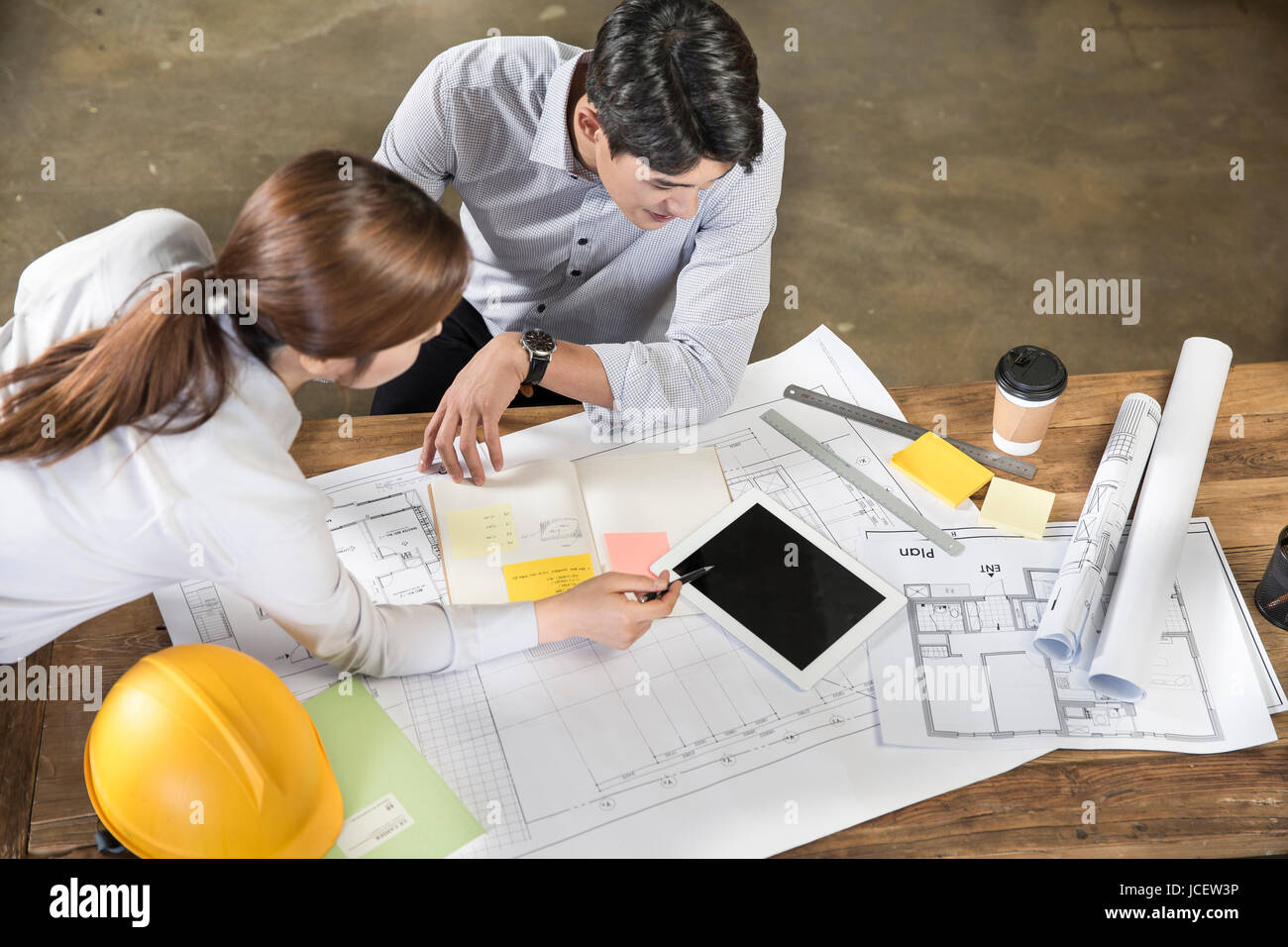Young architects working at office Stock Photo - Alamy