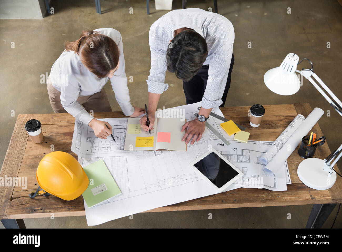 Architects working at office Stock Photo - Alamy