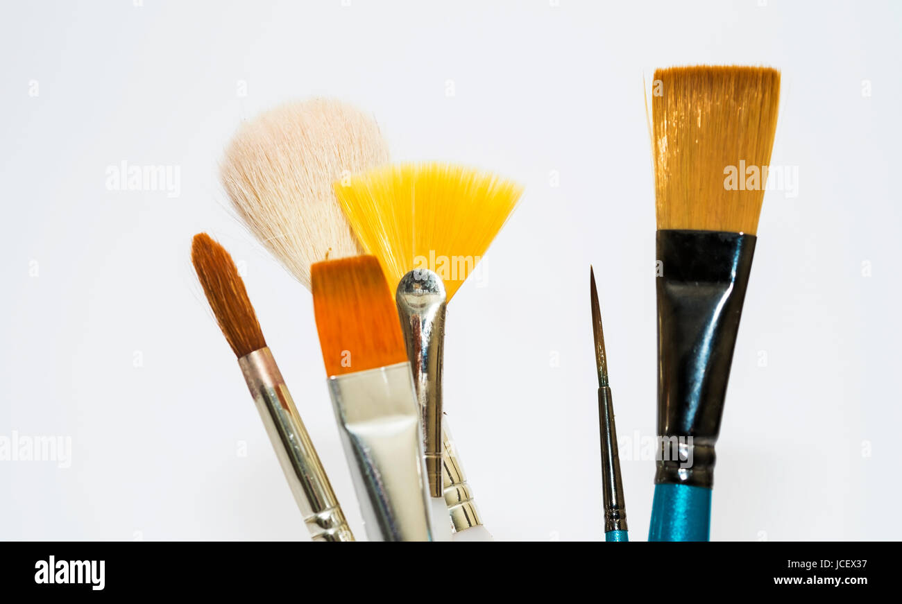 Various artists paint brushes of different sizes and shapes Stock Photo ...