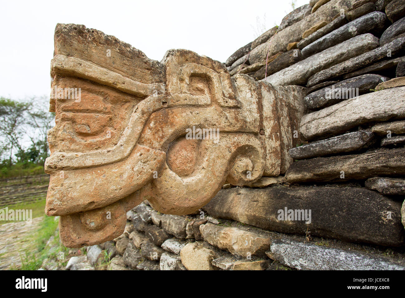 stone dragon head sculpture on Mayan pyramid in Tonina, Chiapas, Mexico ...