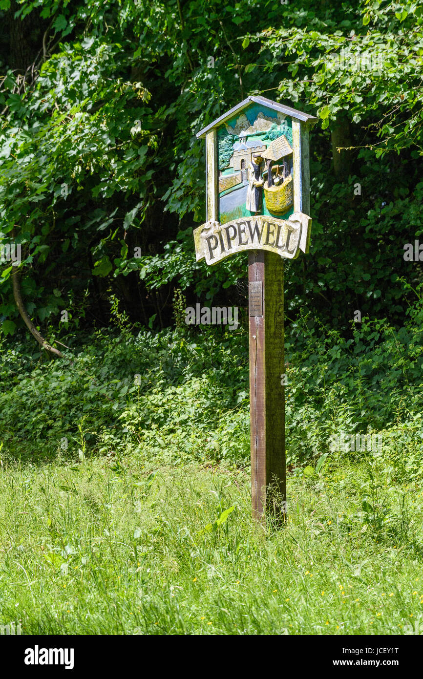 Sign on leaving the hamlet of Pipewell (site of a medieval cistercian ...