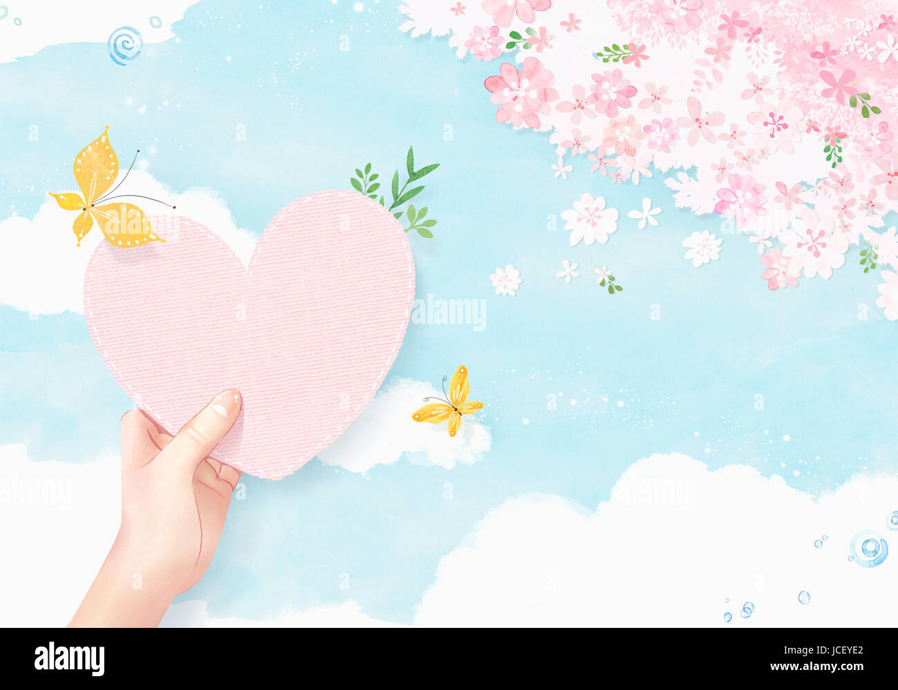 Background of spring with hand holding heart Stock Photo - Alamy