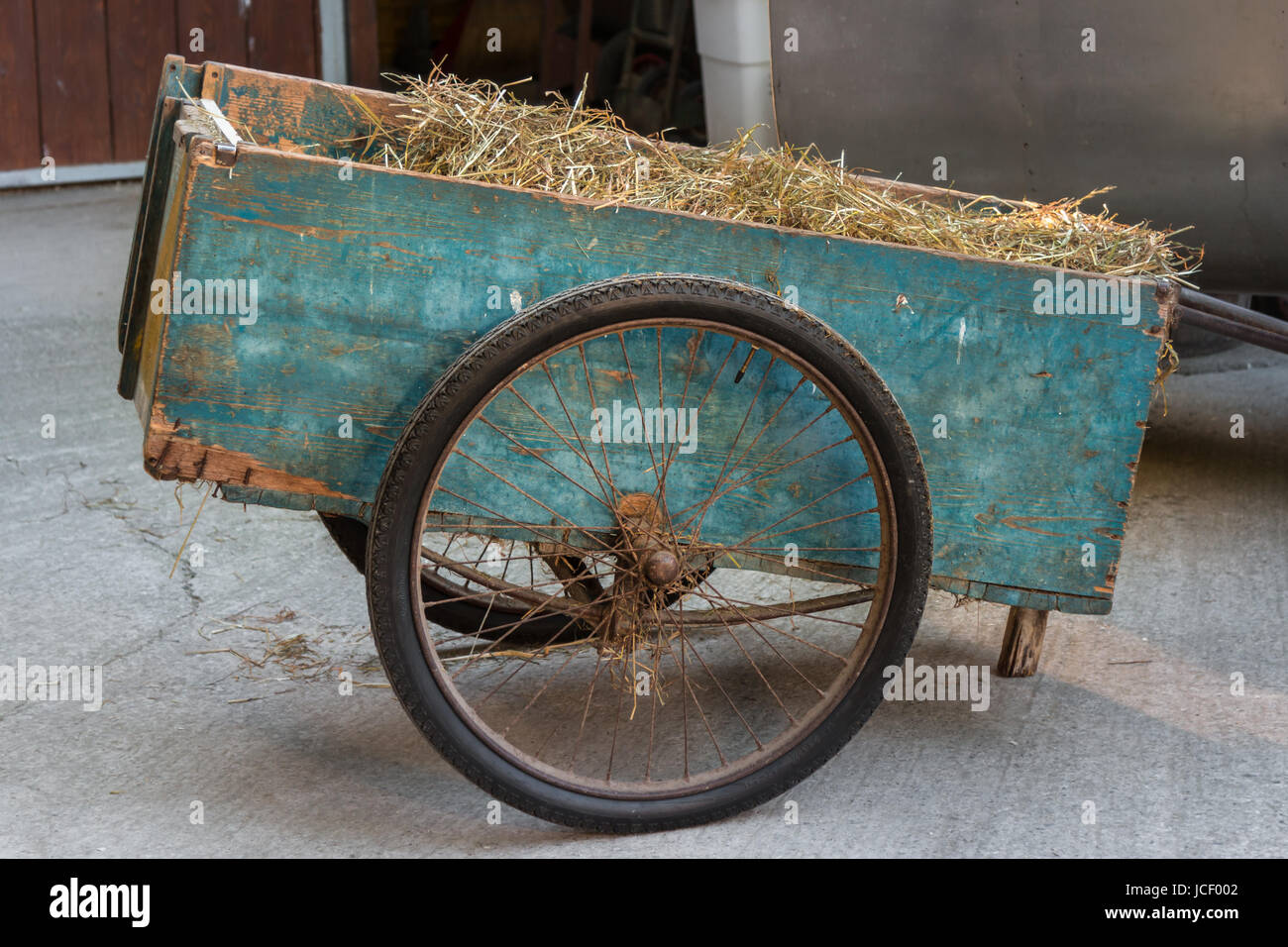 Blue Wooden Wheel Cart Full of Hay in Countryside Location Stock Photo ...