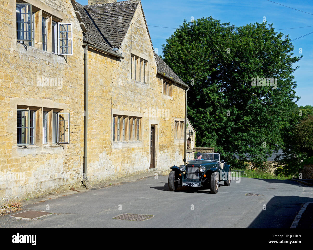 Vintage car in the village of Upper Slaughter, Gloucester, England UK ...