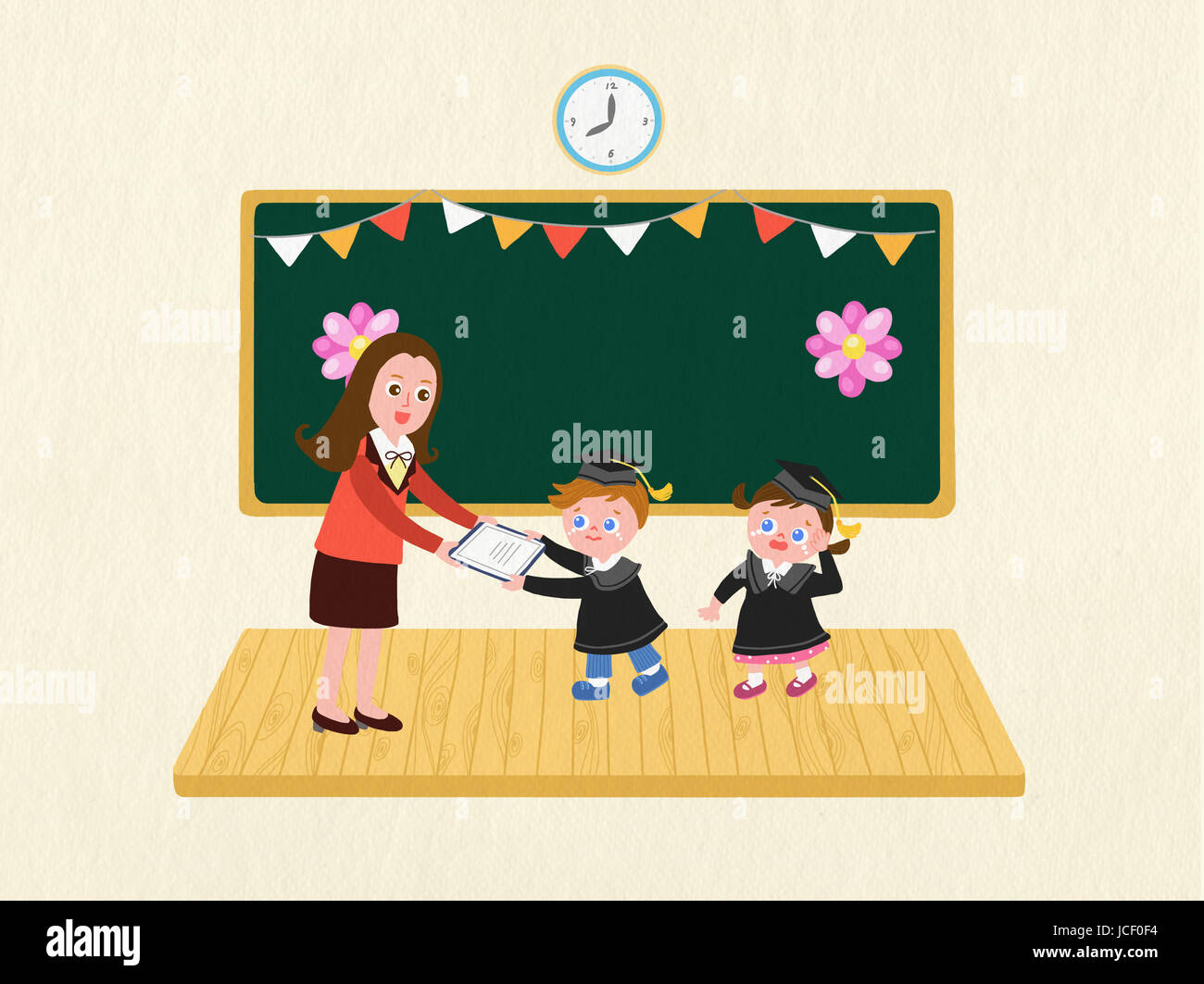 Celebrating kindergarten graduation Stock Photo - Alamy