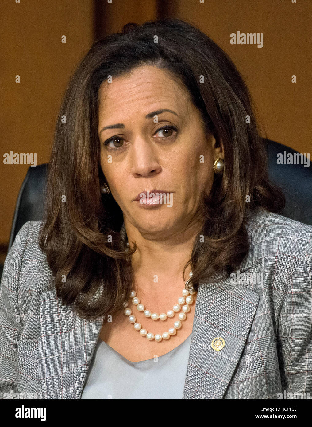 United States Senator Kamala Harris (Democrat of California) listens as ...