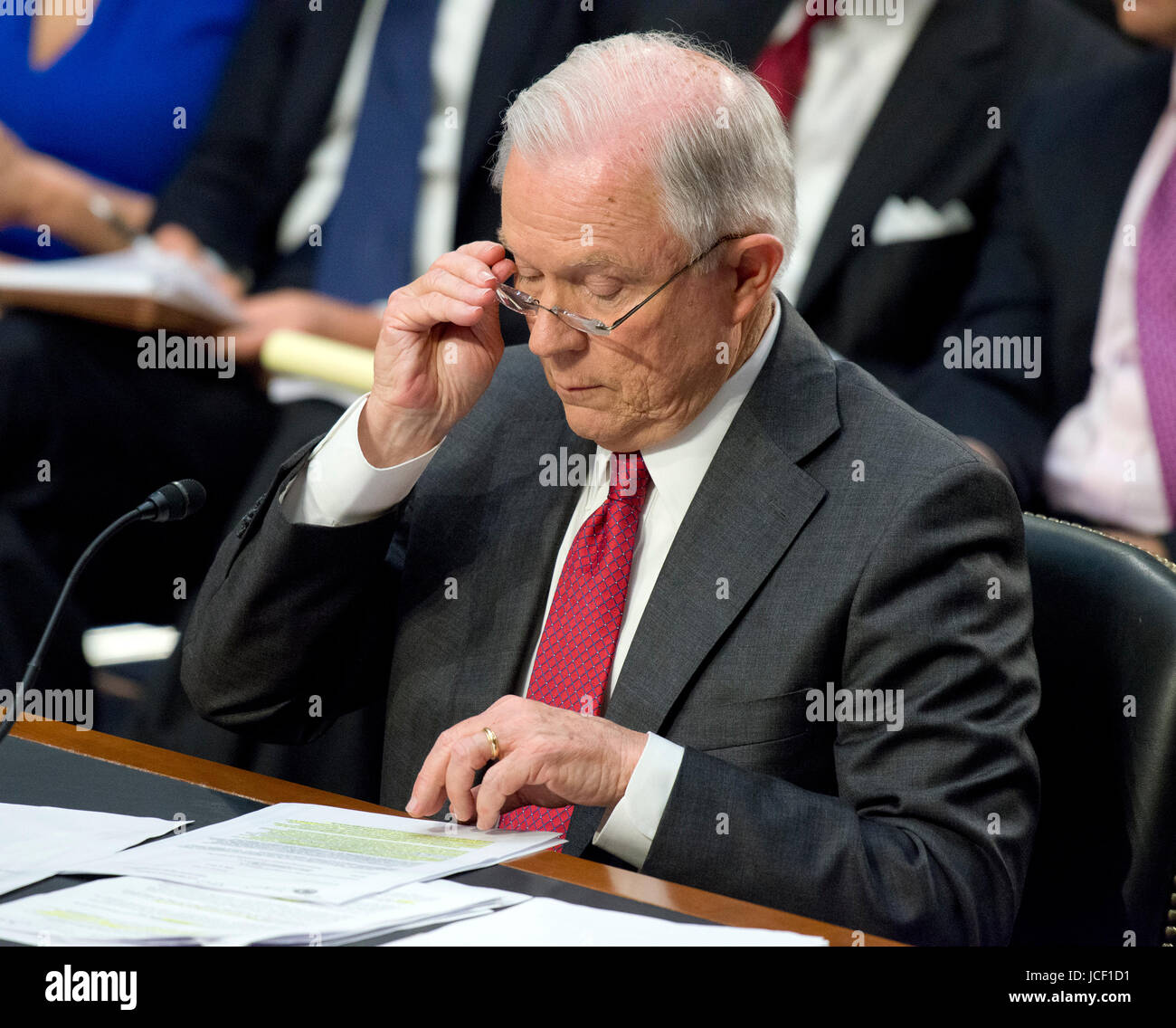 United States Attorney General Jeff Sessions looks over his prepared ...