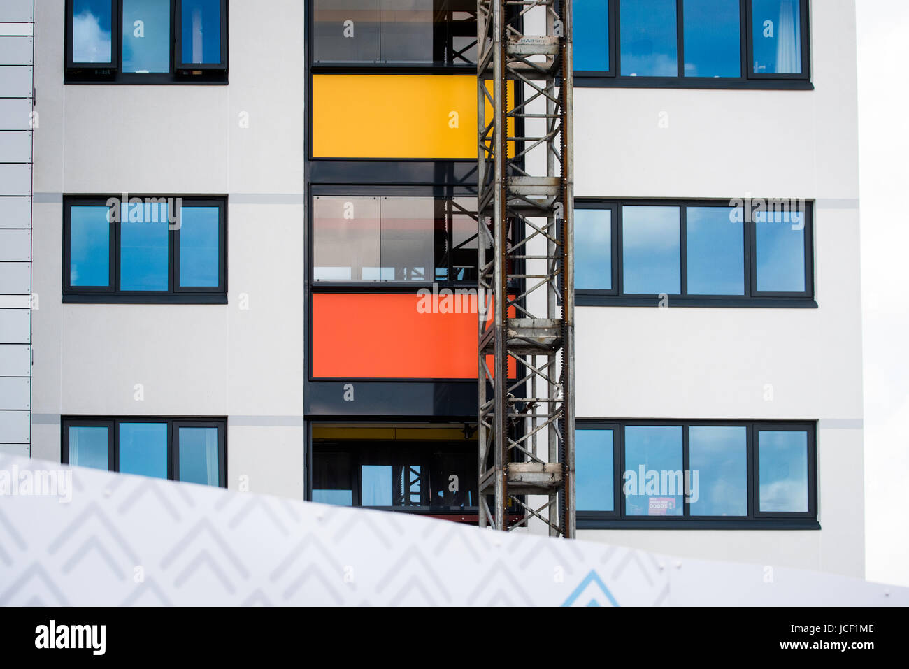 Dangerous flammable cladding panels being removed from on a tower block ...