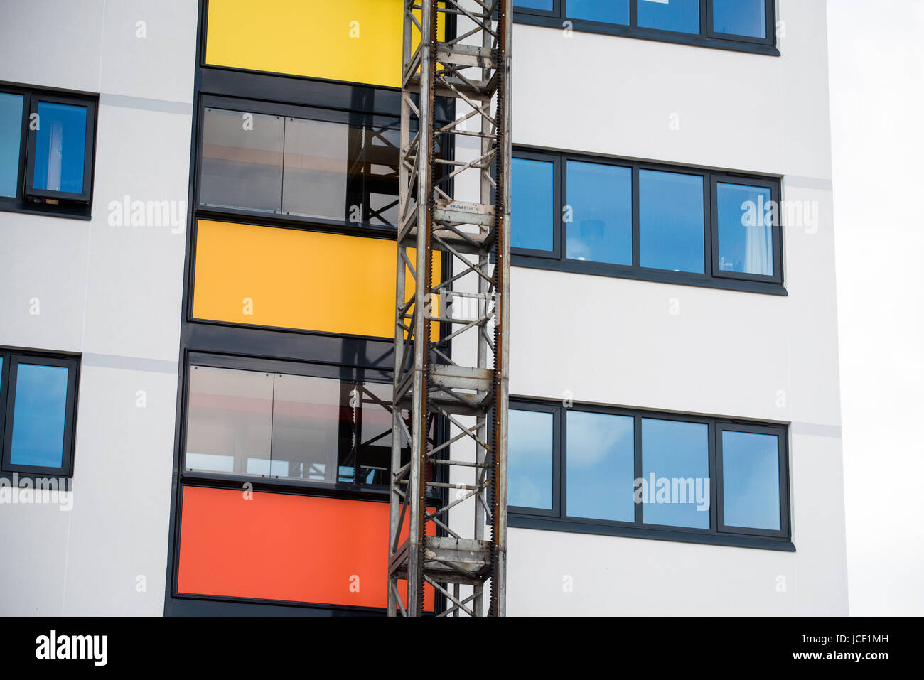Dangerous flammable cladding panels being removed from on a tower block ...