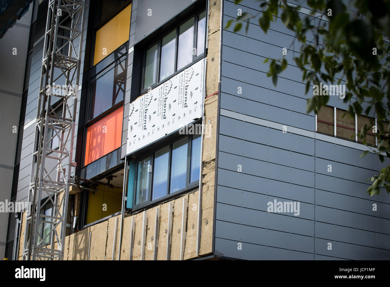 Dangerous flammable cladding panels being removed from on a tower block ...
