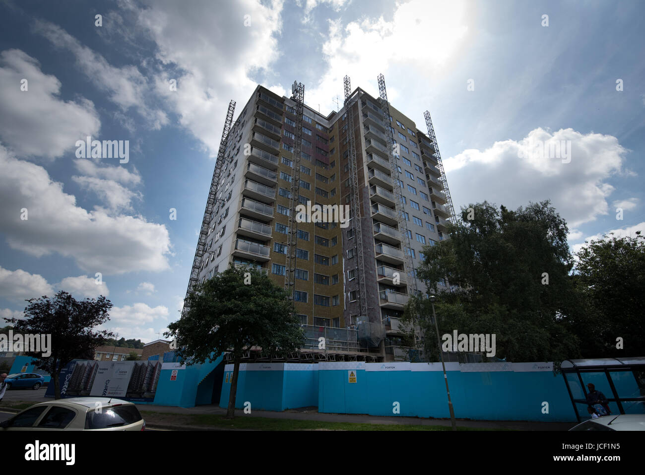 Dangerous flammable cladding panels being removed from on a tower block ...