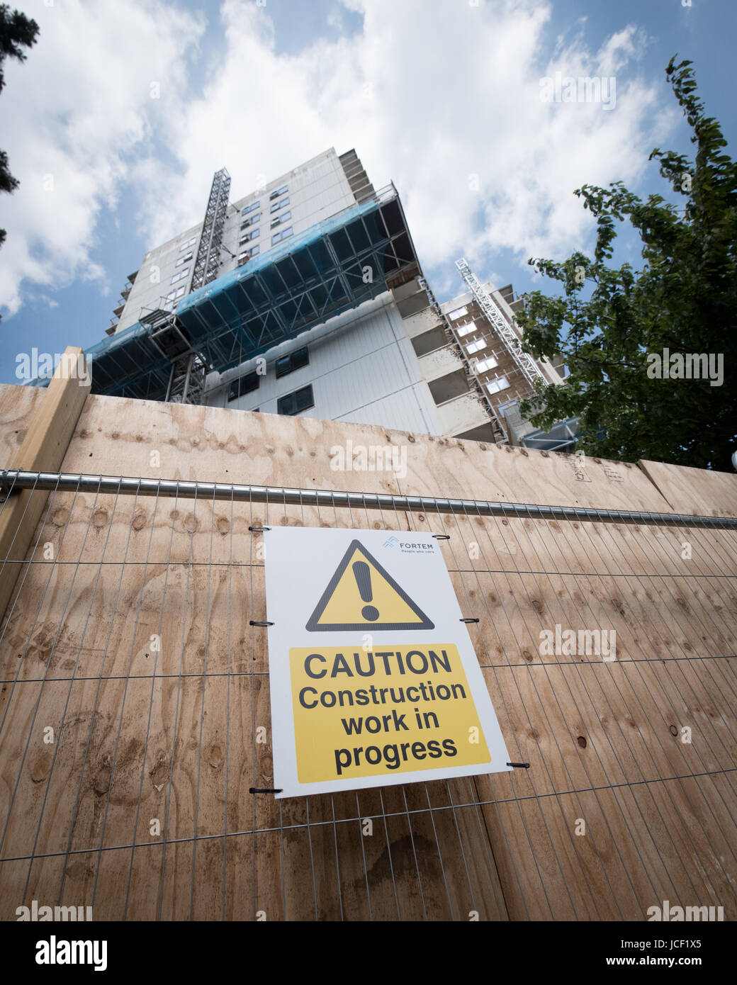 Dangerous flammable cladding panels being removed from on a tower block ...