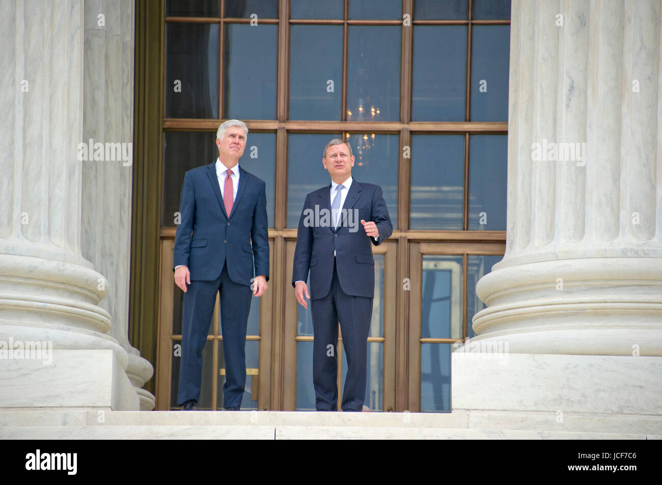 Chief Justice of the United States John G. Roberts, Jr., right, and ...