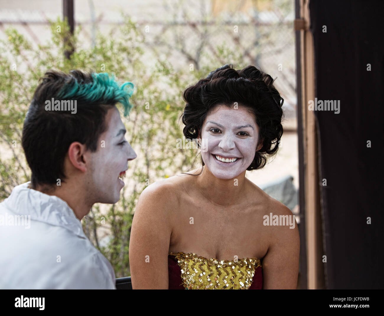 Two cirque performers in makeup laughing backstage Stock Photo - Alamy