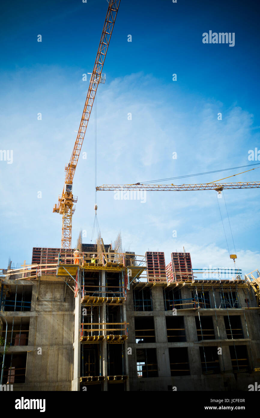 apartments building in construction Stock Photo - Alamy