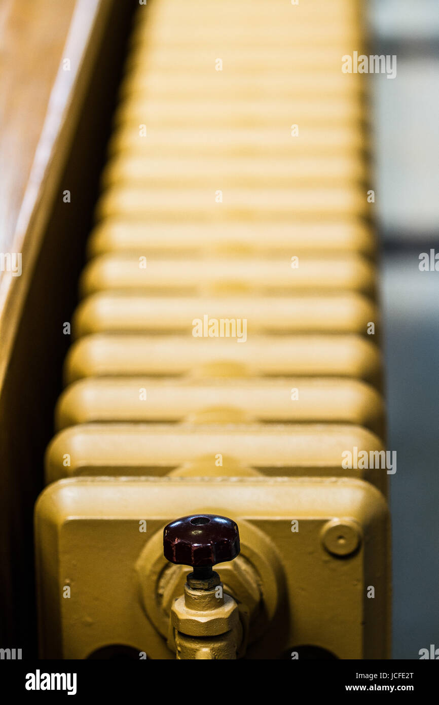Beige Water Radiator Heater on a Wall Stock Photo - Alamy