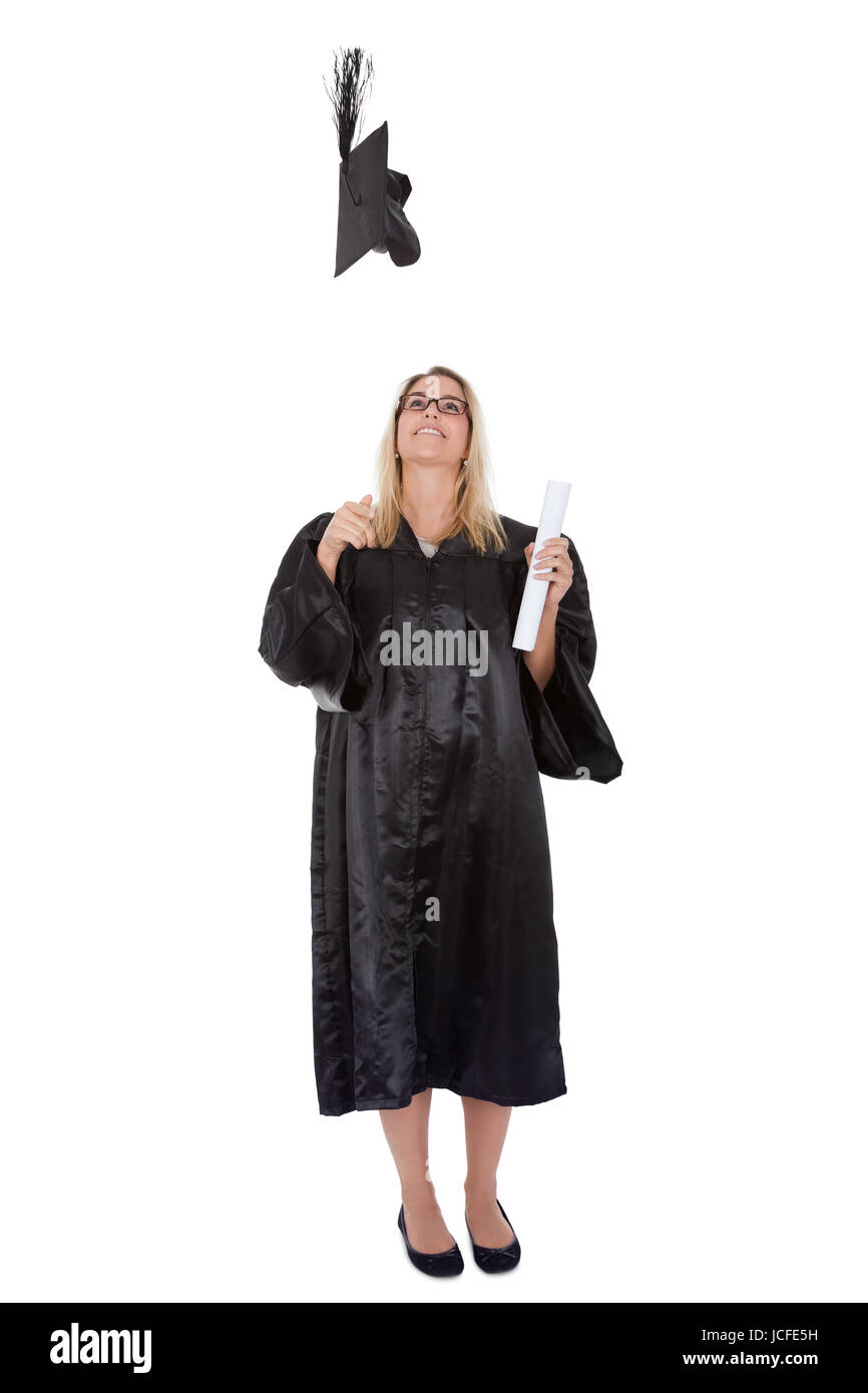 Beautiful female student graduating. Isolated on white Stock Photo - Alamy