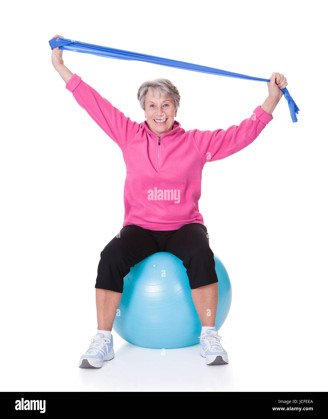 Senior Woman Stretching Exercising Equipment On White Background Stock ...