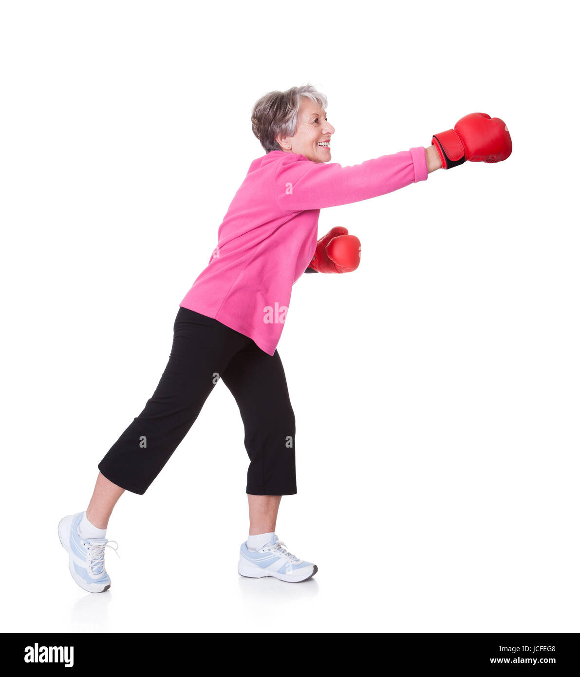 Portrait Of Senior Female Boxer Isolated On White Background Stock ...