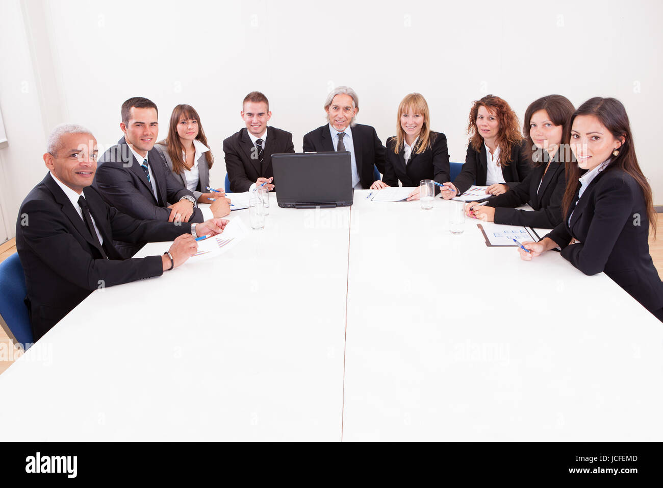 Mature man sitting round table hi-res stock photography and images - Alamy
