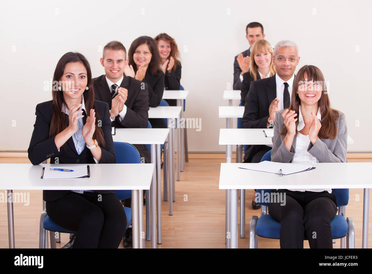 Group Businesspeople Raising Their Hands In Meeting Stock Photo - Alamy
