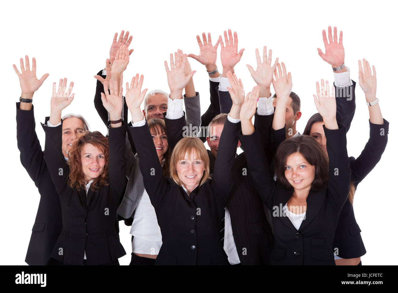 High angle view of a diverse group of business people waving in ...