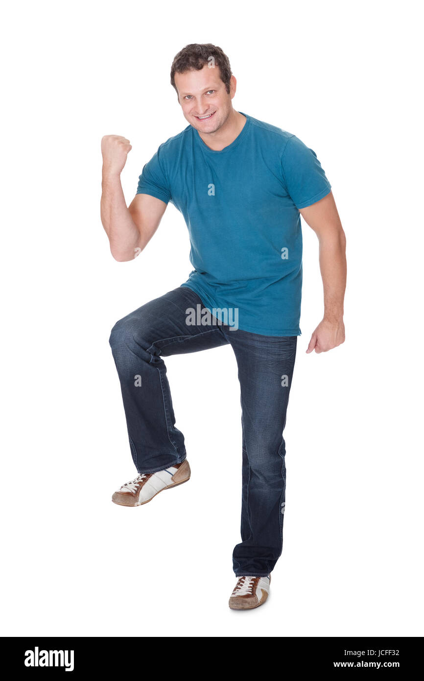 Portrait of a excited man in casual outfit. Isolated on white ...