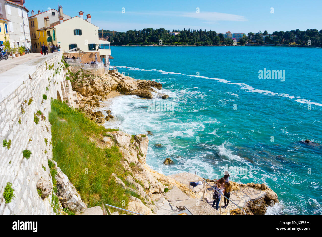 Beach Baluota, stone beach along svetog Kriza street, old town, Rovinj ...