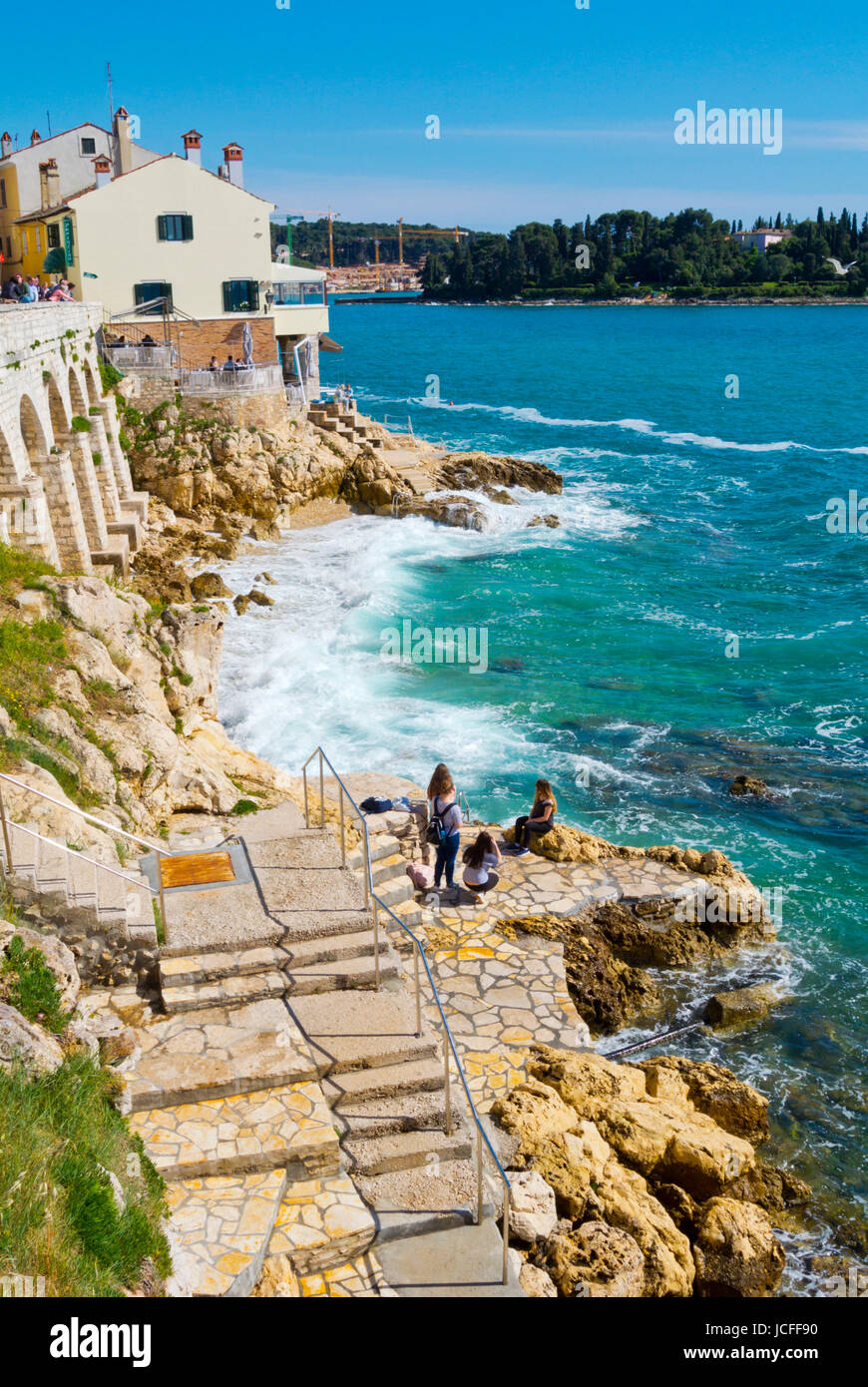 Beach Baluota, stone beach along svetog Kriza street, old town, Rovinj ...