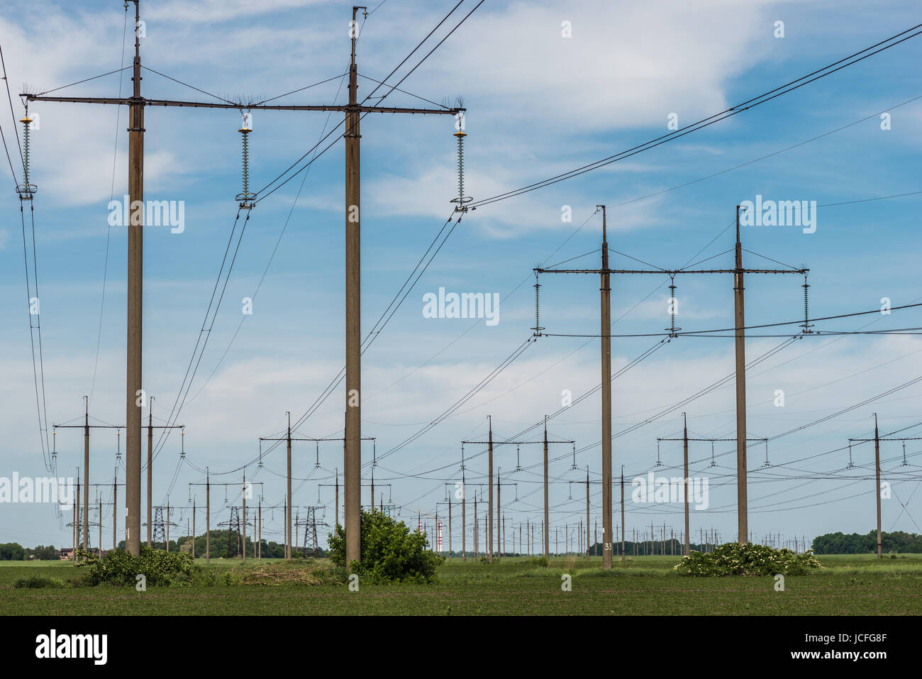 High voltage electric transmission tower energy pylon Stock Photo - Alamy