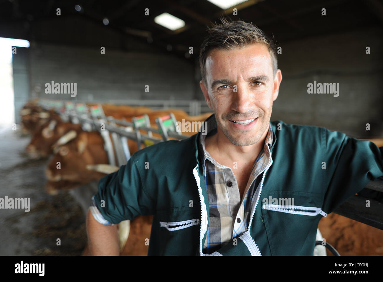Smiling breeder standing in hi-res stock photography and images - Alamy