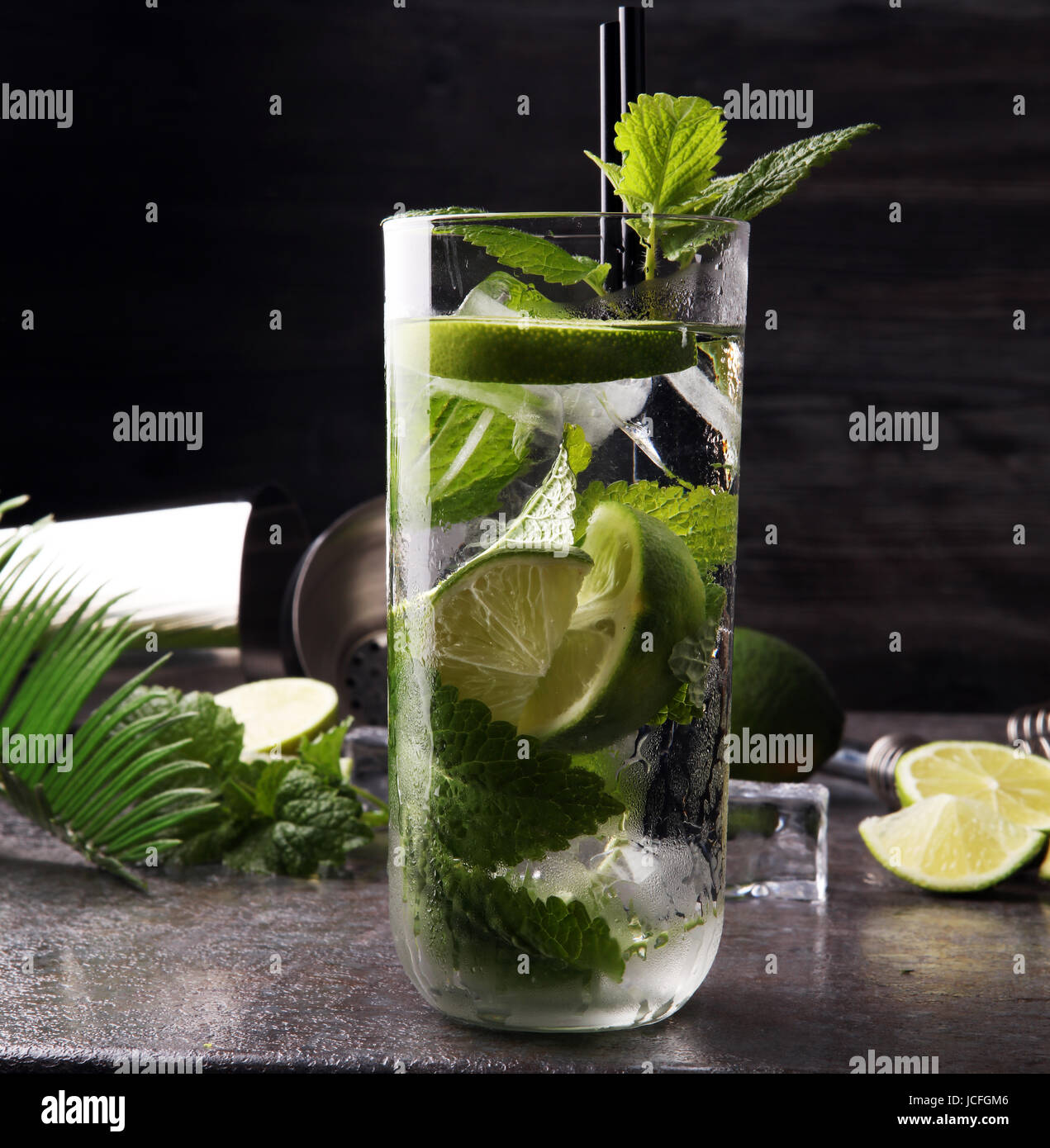 Mojito cocktail with lime and mint in highball glass Stock Photo - Alamy