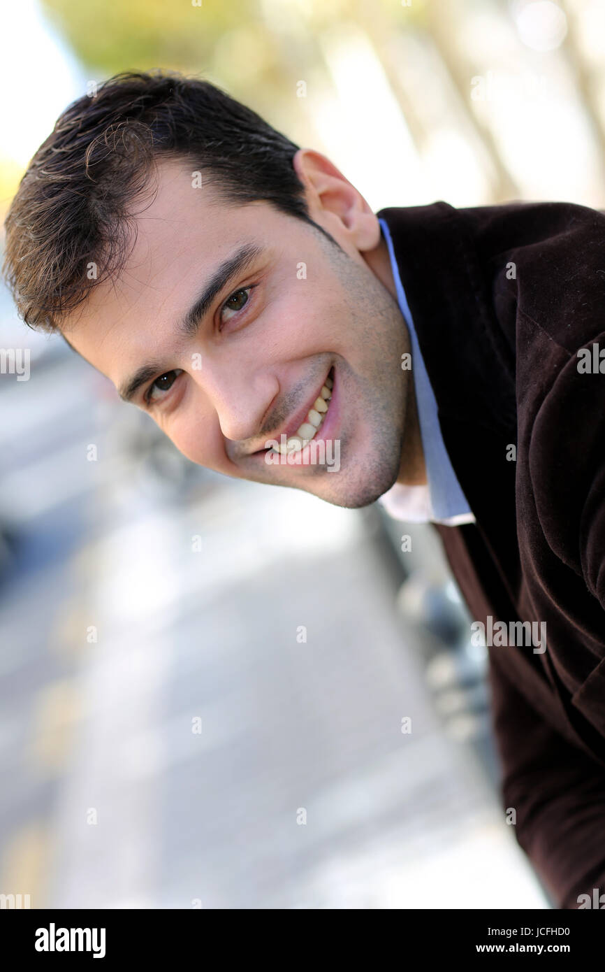 Portrait of handsome guy in town Stock Photo - Alamy