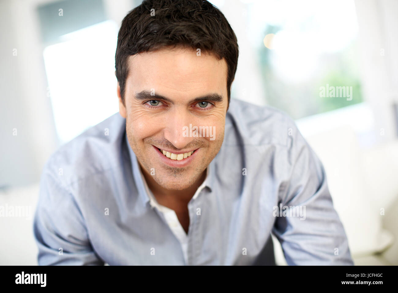 Portrait of handsome man with blue eyes Stock Photo - Alamy