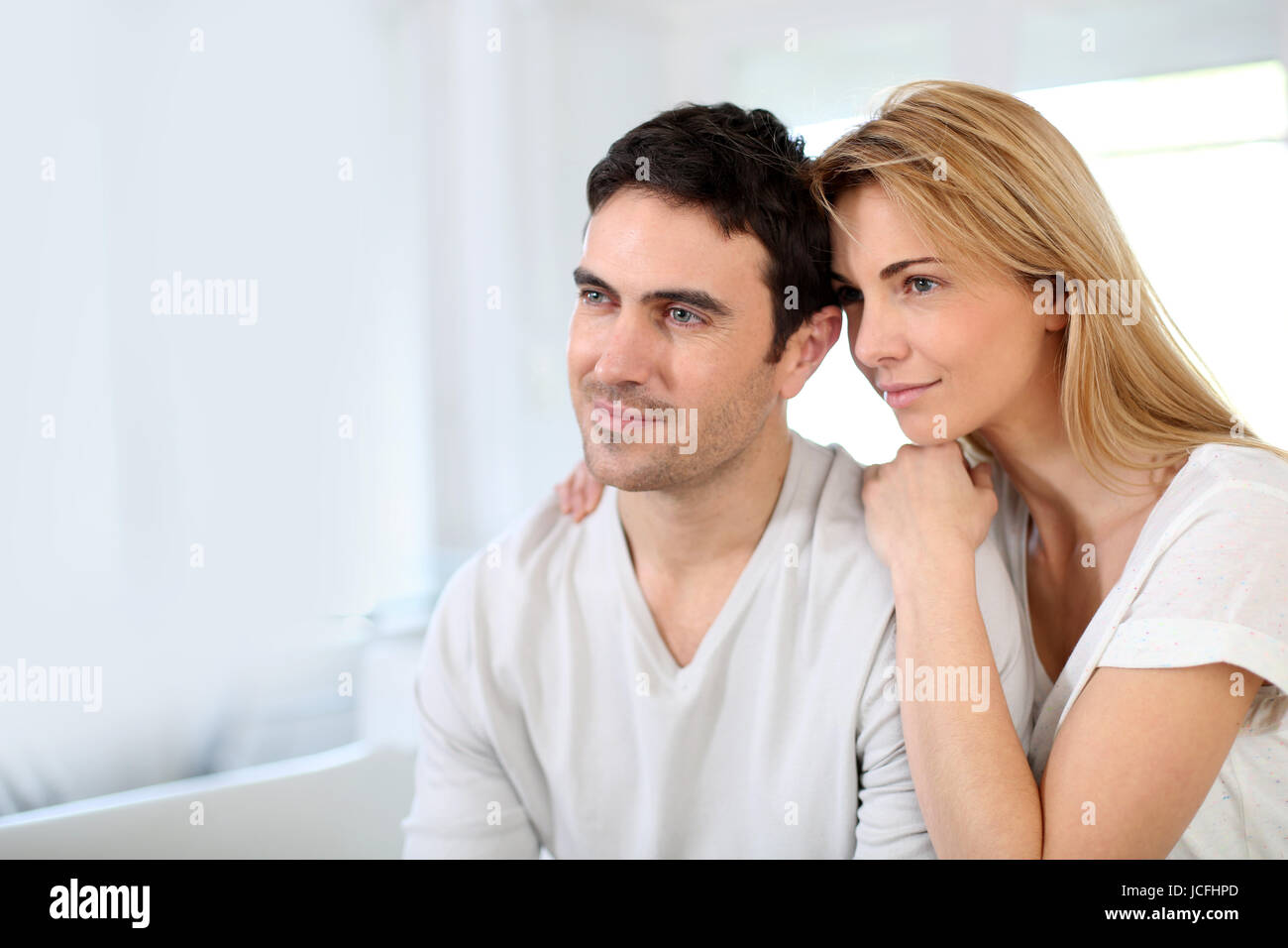 35-year-old couple looking toward their future Stock Photo - Alamy
