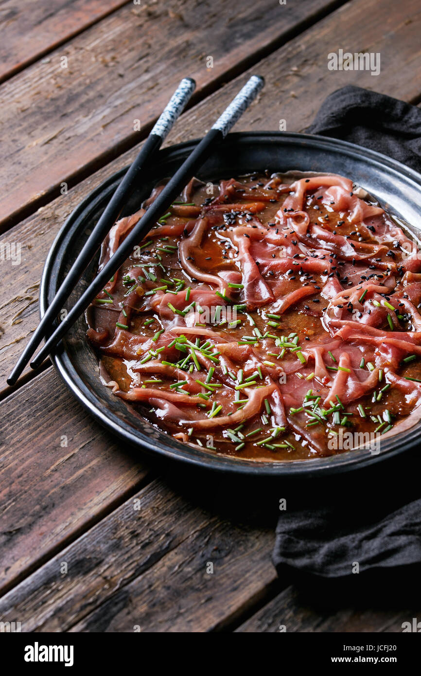Asian style Beef carpaccio Stock Photo - Alamy