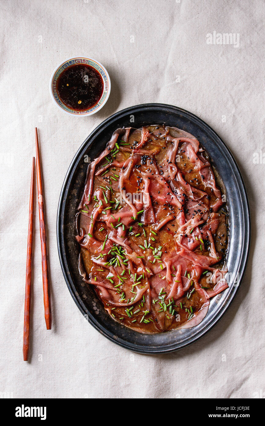 Asian style Beef carpaccio Stock Photo - Alamy