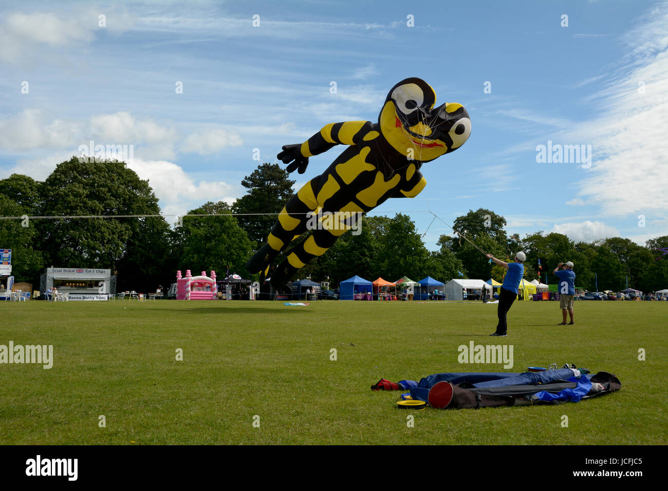 Two children enjoy flying kite hi-res stock photography and images - Alamy